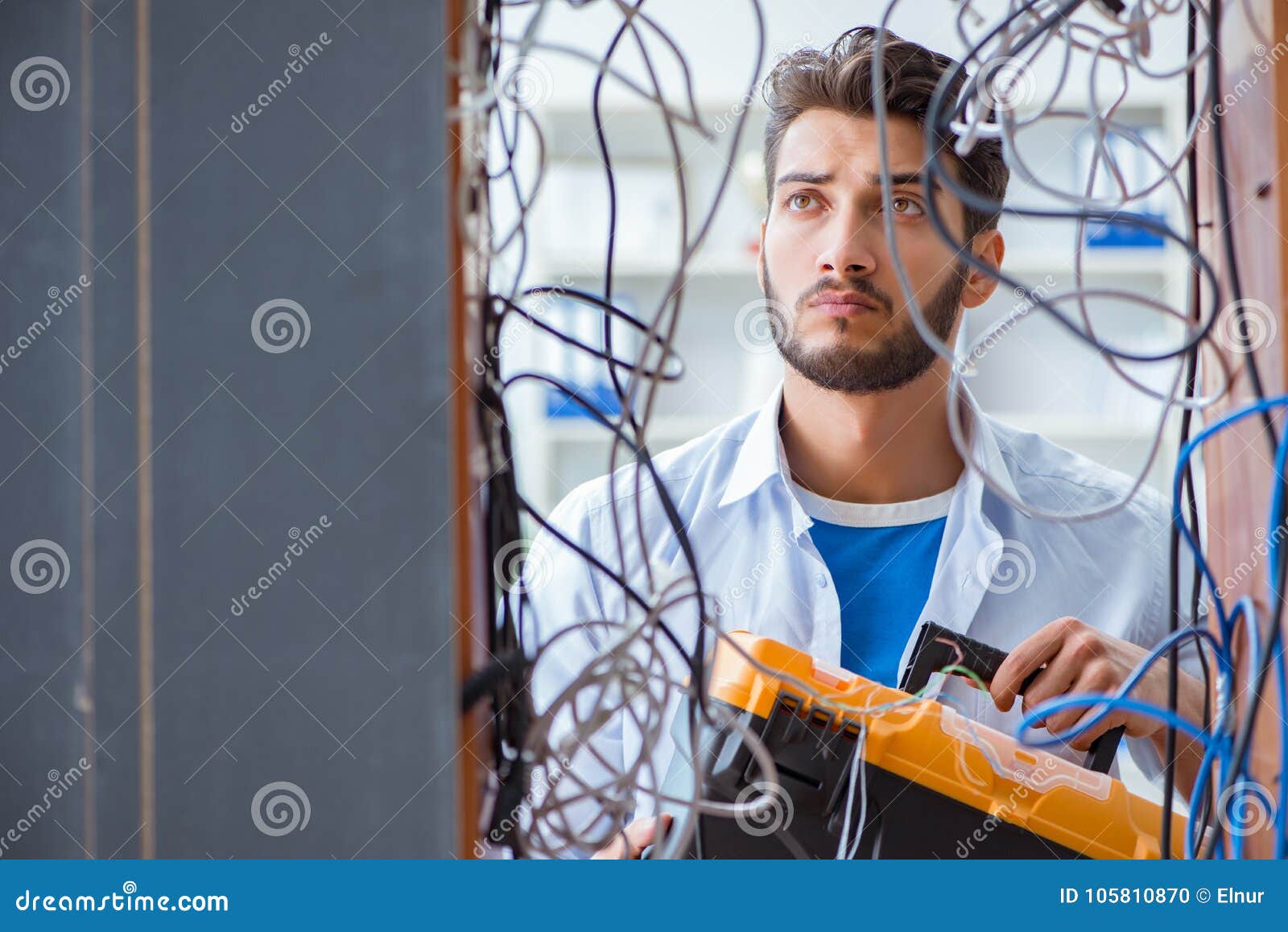 The Computer Repairman Working on Repairing Network in it Workshop ...