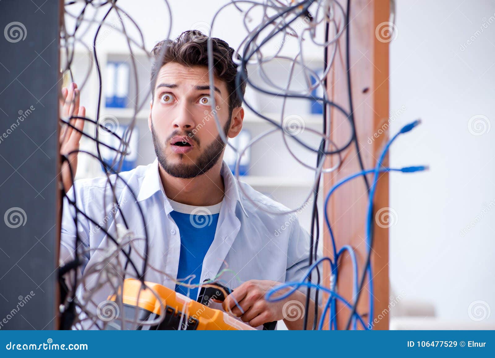 The Computer Repairman Working on Repairing Network in it Workshop ...