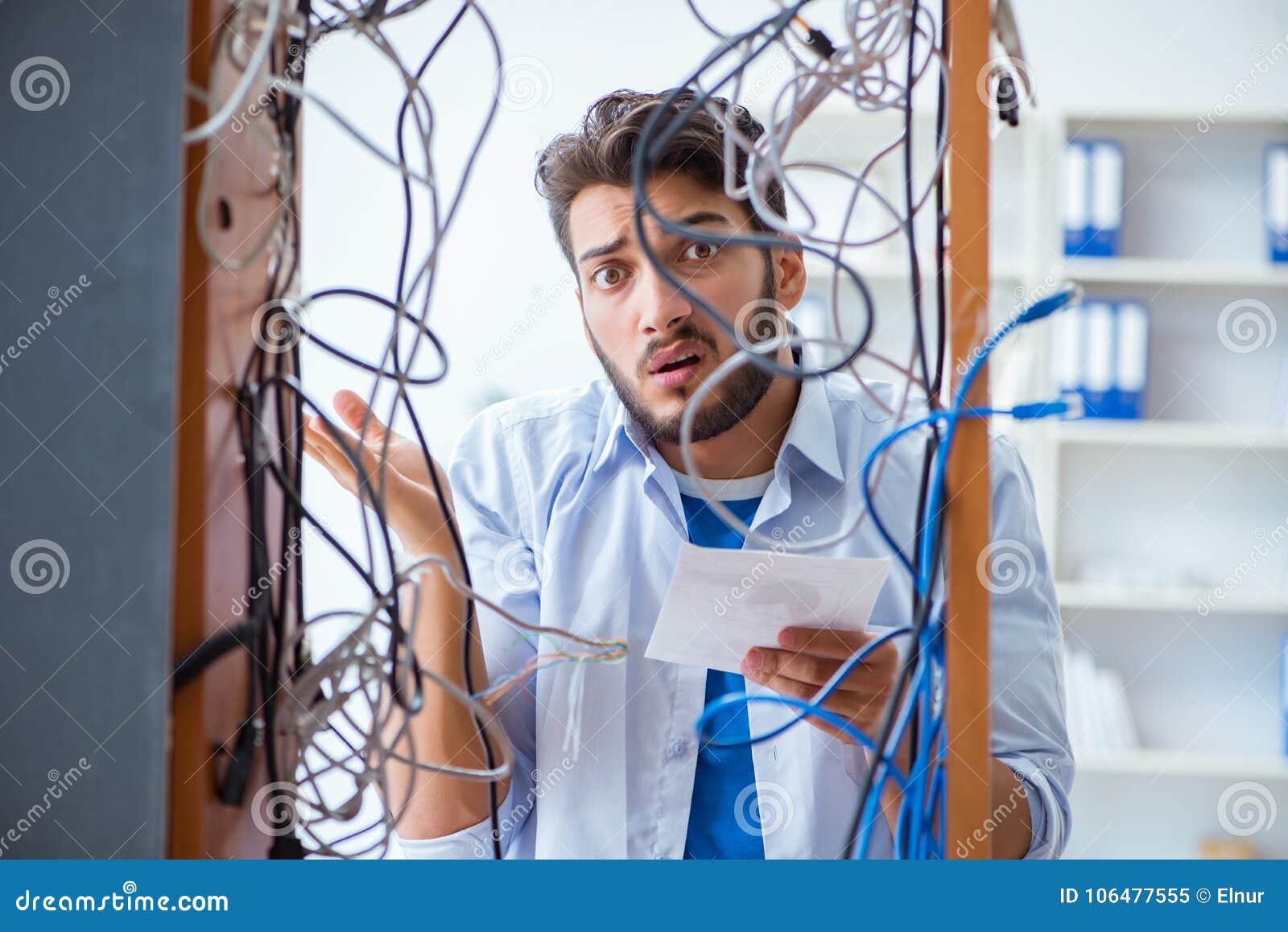 The Computer Repairman Working on Repairing Network in it Workshop ...