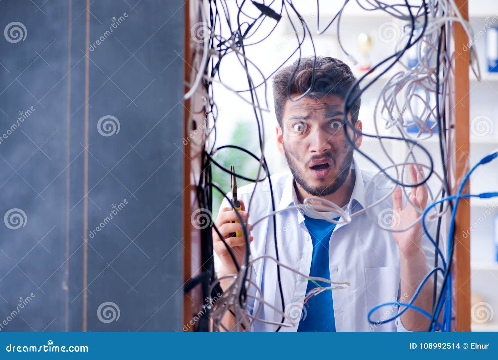 The Computer Repairman Working on Repairing Network in it Workshop ...
