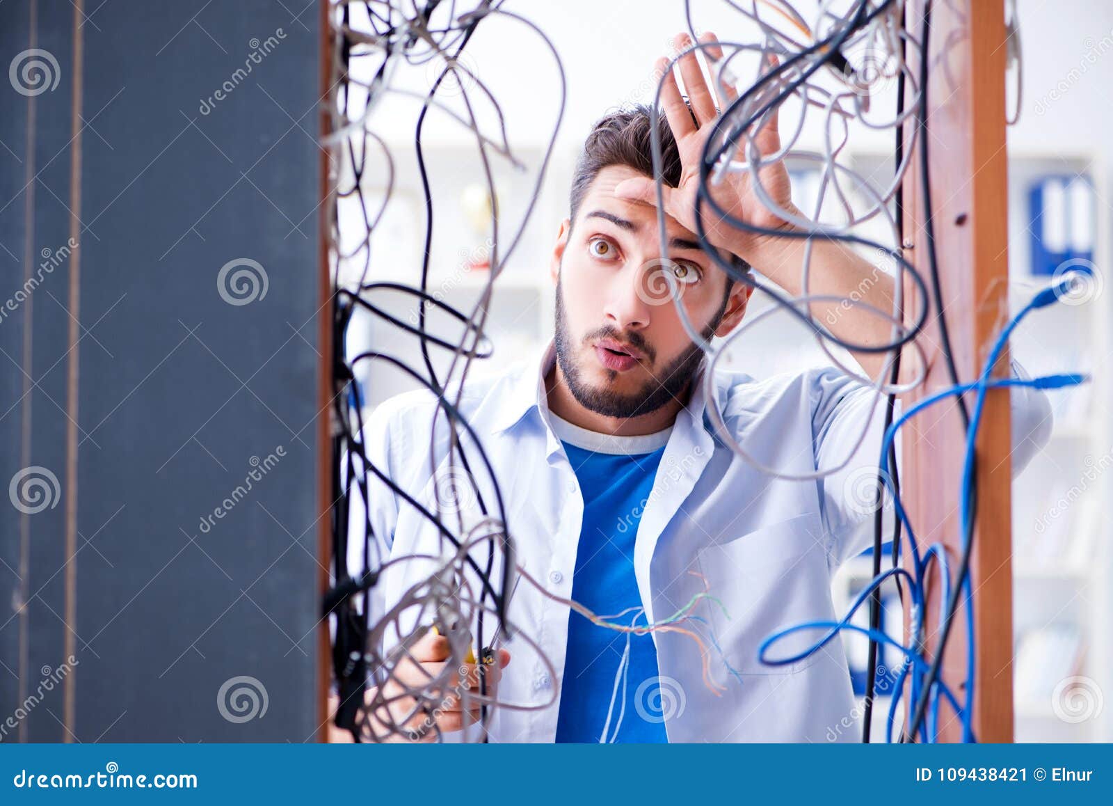The Computer Repairman Working on Repairing Network in it Workshop ...