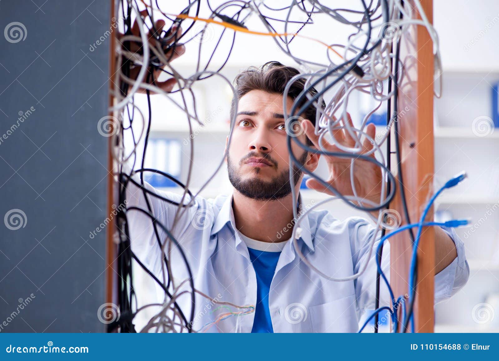 The Computer Repairman Working on Repairing Network in it Workshop ...