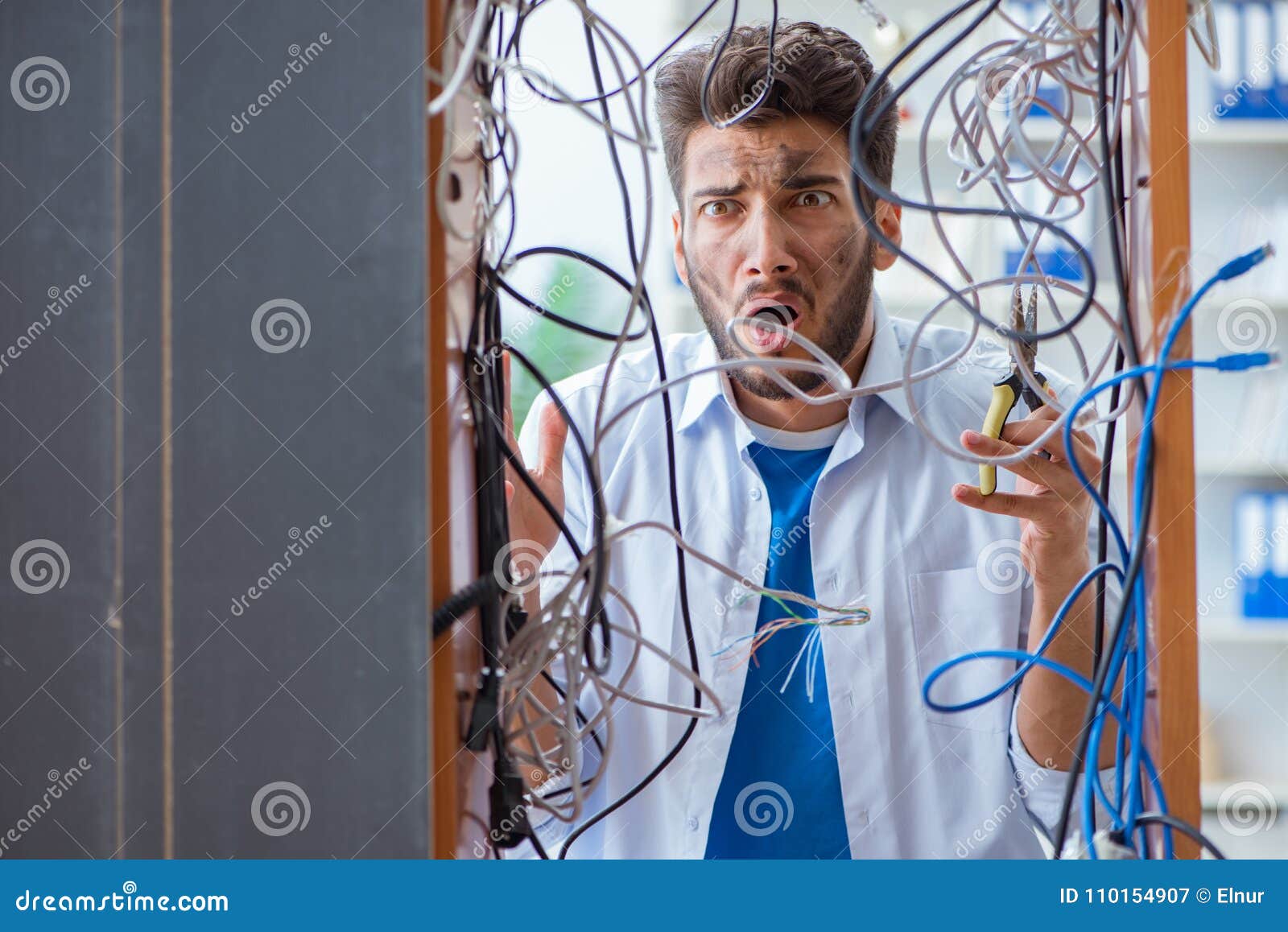 The Computer Repairman Working on Repairing Network in it Workshop ...