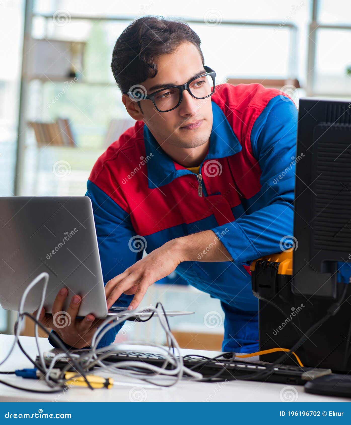 Computer Repairman Working on Repairing Computer in it Workshop Stock ...