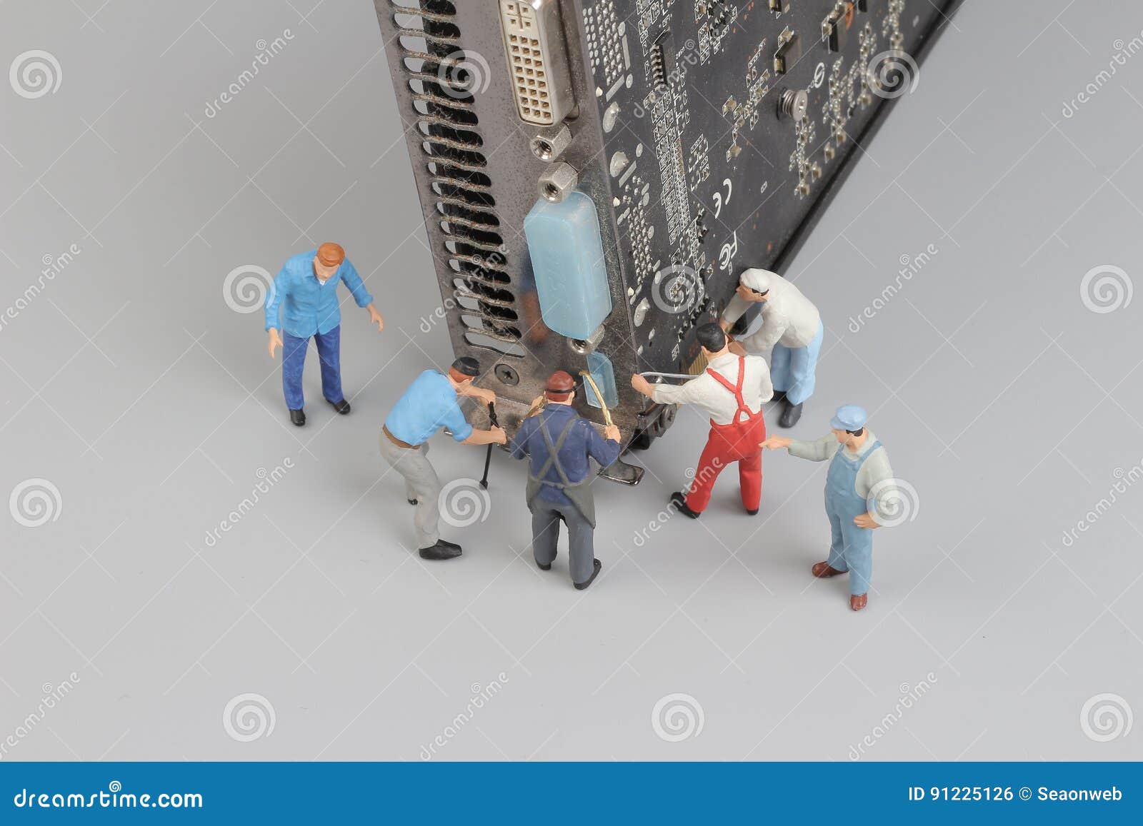 Computer Repairs Concept with Mini Figures and Components Stock Photo ...