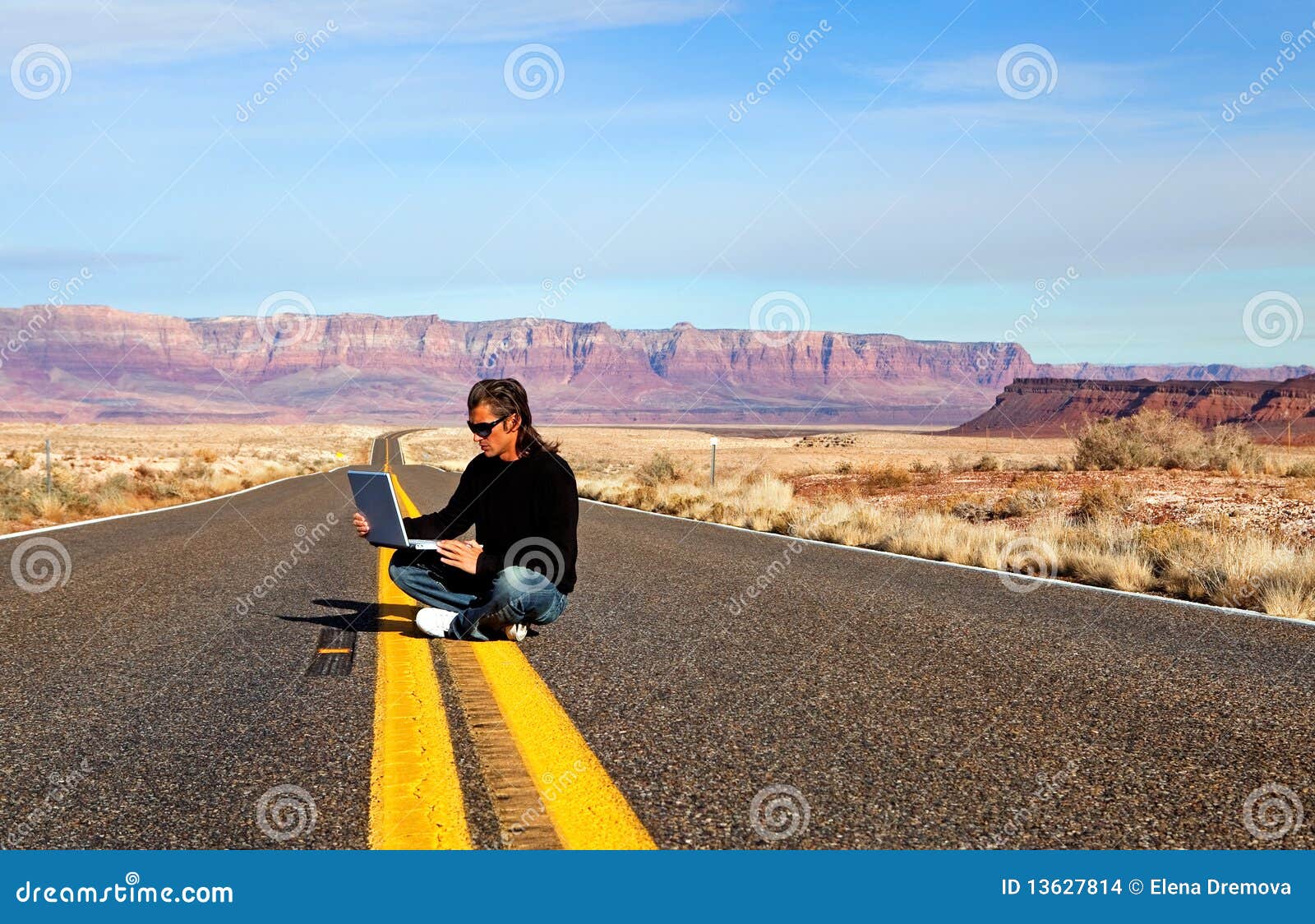 With computer on the road stock photo. Image of loneliness - 13627814