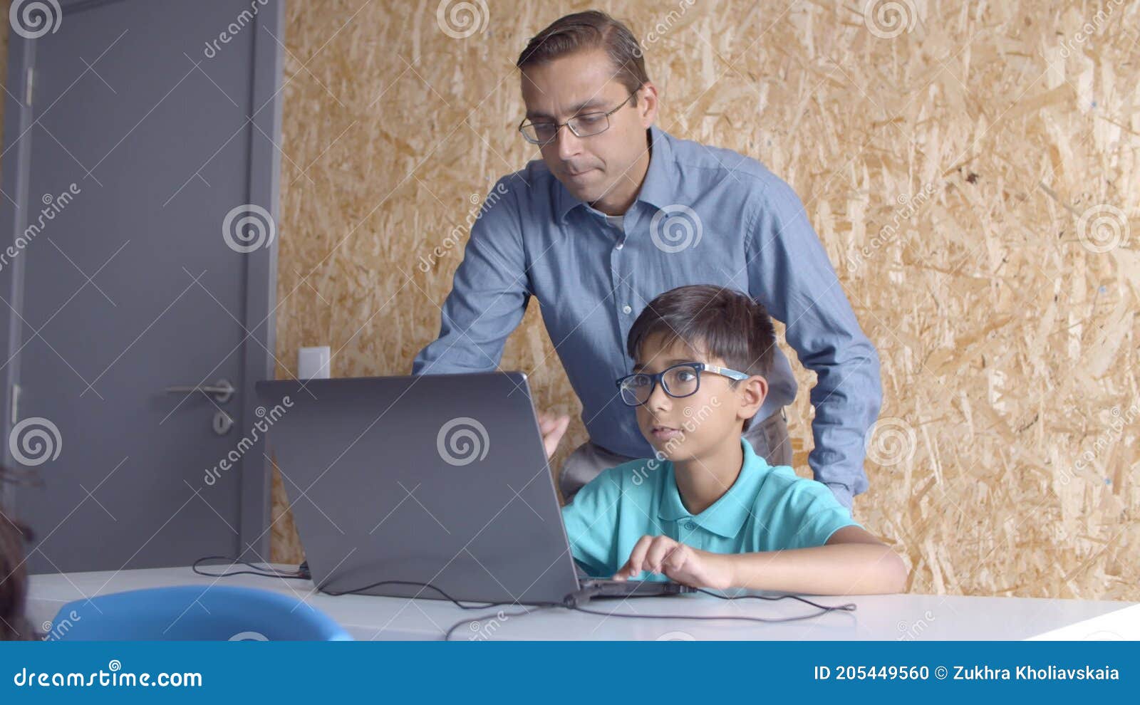 Computer Science Teacher Explaining Task To Schoolboy Stock Footage ...