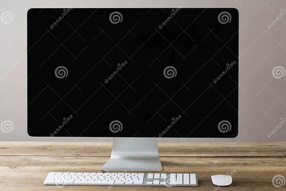 Computer Screen and Keyboard and Mouse on a Wood Table with Whit Stock ...
