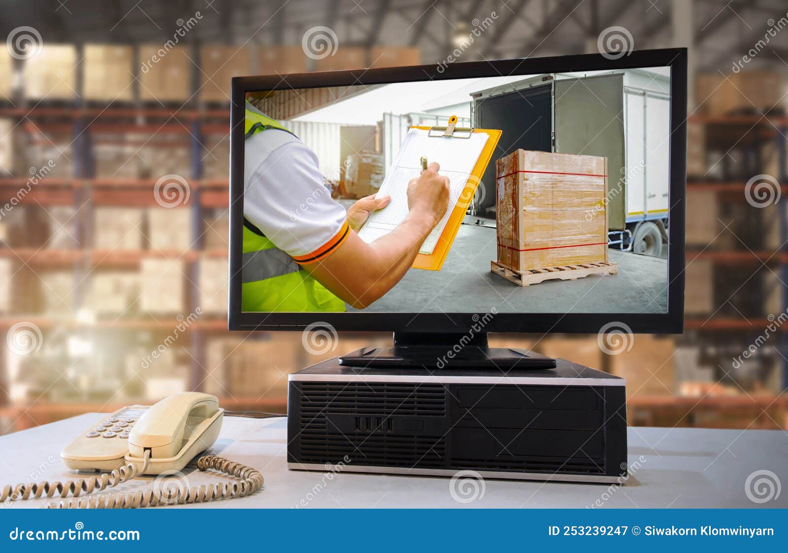 Computer Screen with Workers Controlling the Loading of Cargo into ...