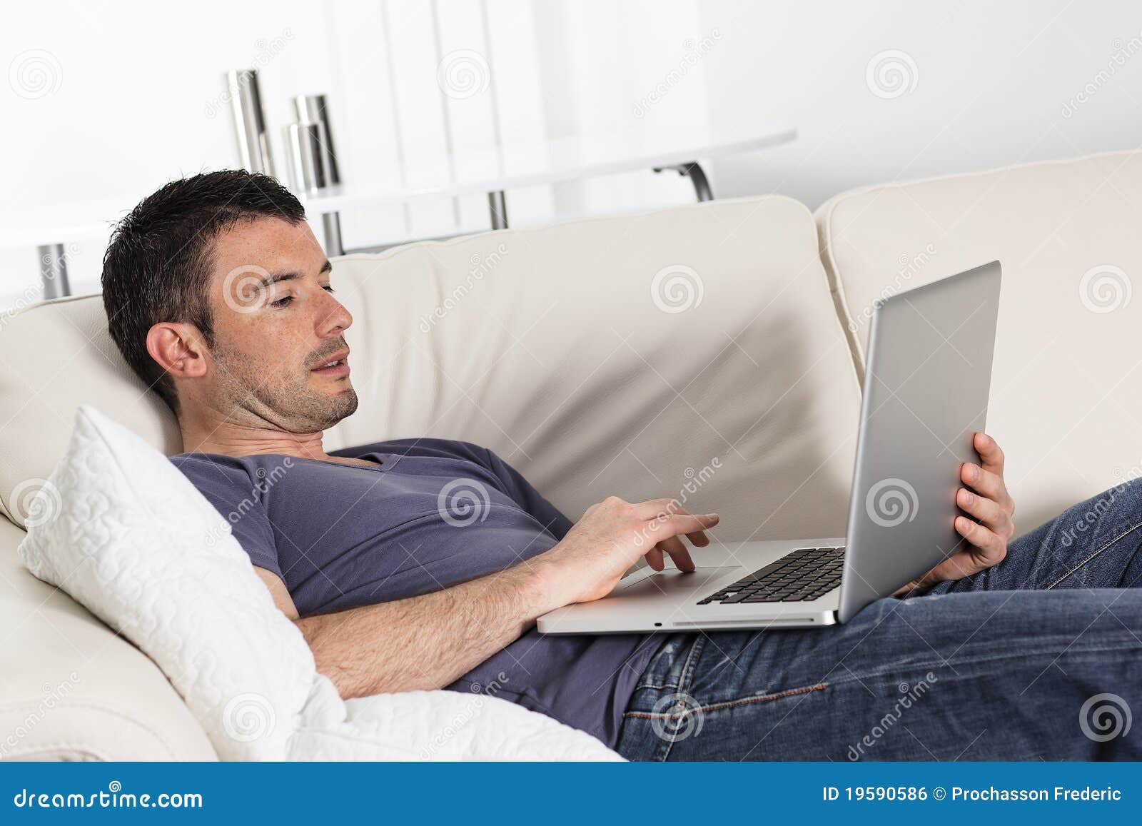 Computer on sofa stock photo. Image of portrait, attractive - 19590586