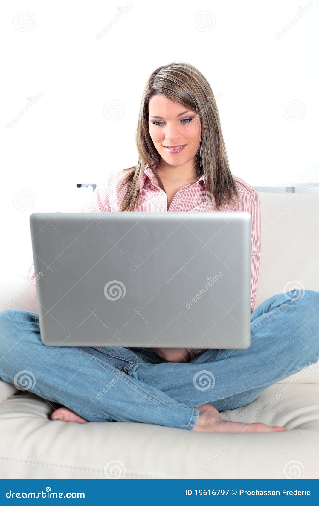 Computer on sofa stock image. Image of internet, happy - 19616797