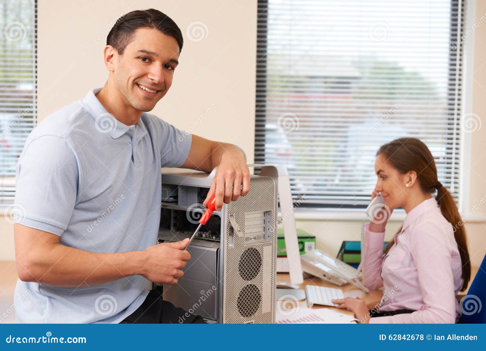 Computer it Support Worker Fixing Machine in Office Stock Photo - Image ...