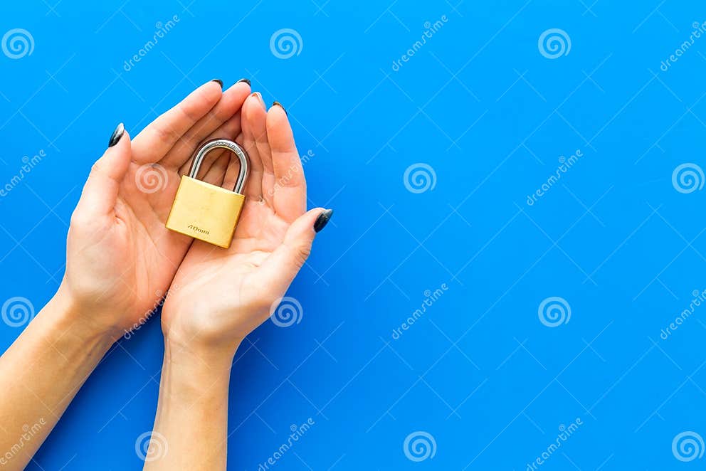 Computer System Protection from Hacker with Locker in Hands on Blue ...