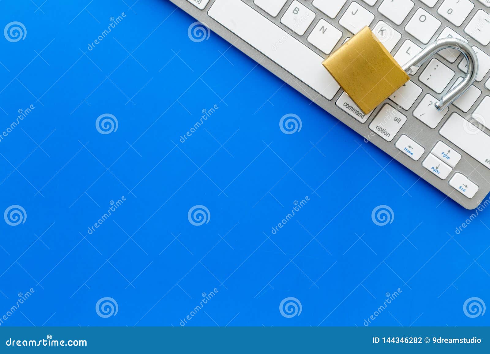 Computer System Protection from Hacker with Locker and Keyboard on Blue ...