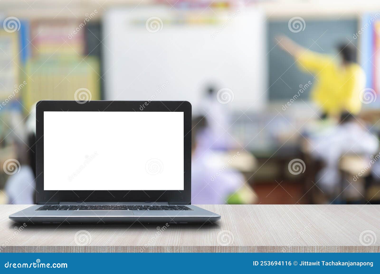 Computer on the Table, Blur Image of the Children Classroom As ...
