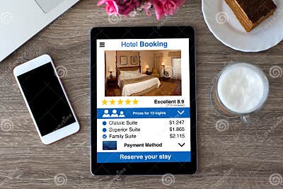 Computer Tablet with App Hotel Booking and Touch Phone Table Stock ...