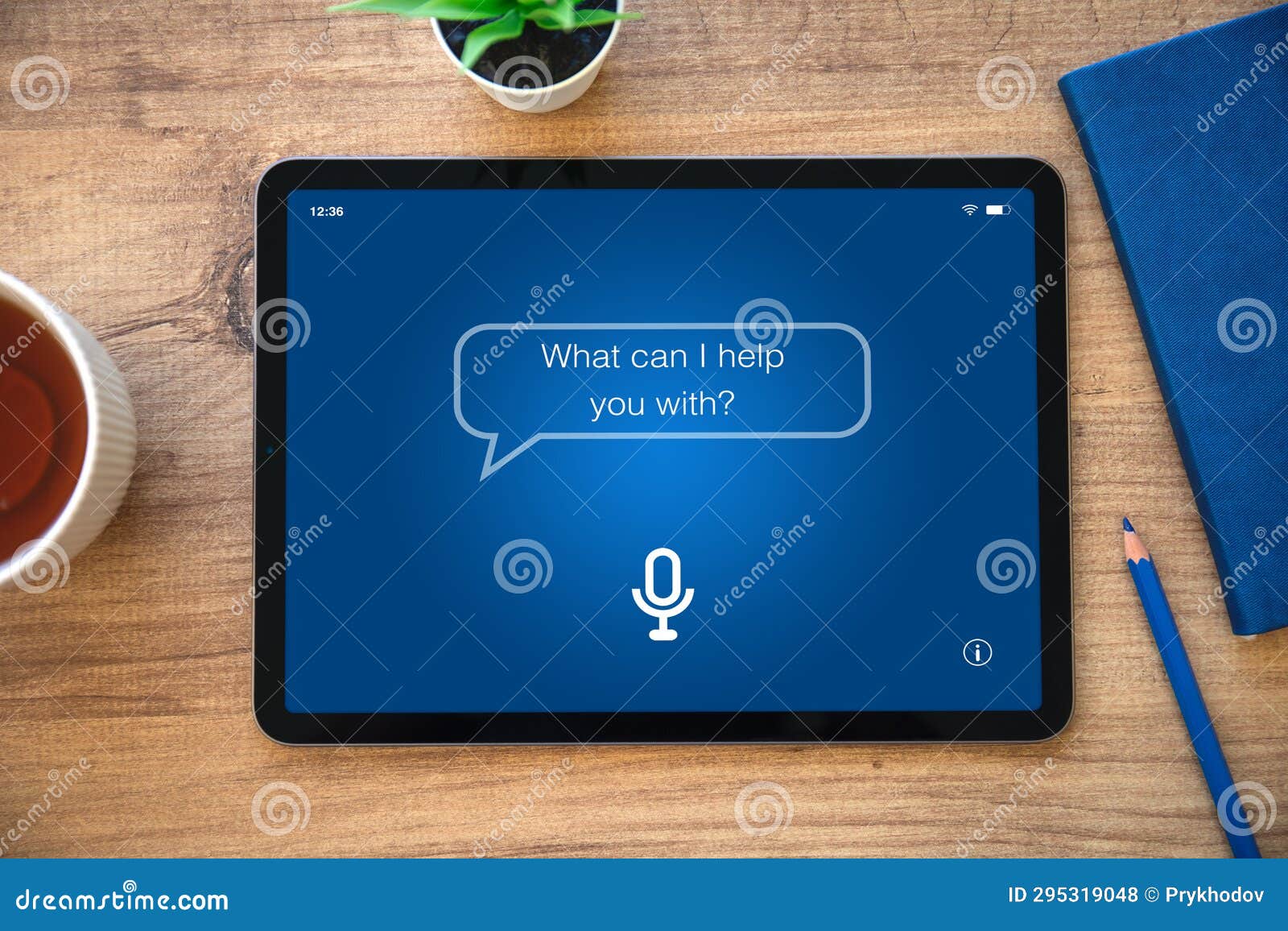 Computer Tablet with App Personal Assistant Screen on the Table in ...