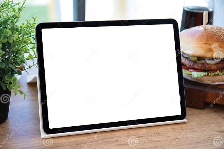 Computer Tablet with Isolated Screen Background Wooden Table with ...