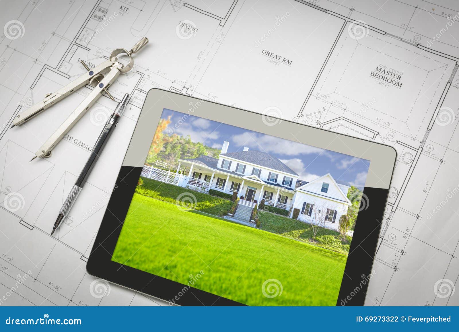Computer Tablet Showing House Image on House Plans, Pencil, Comp Stock ...