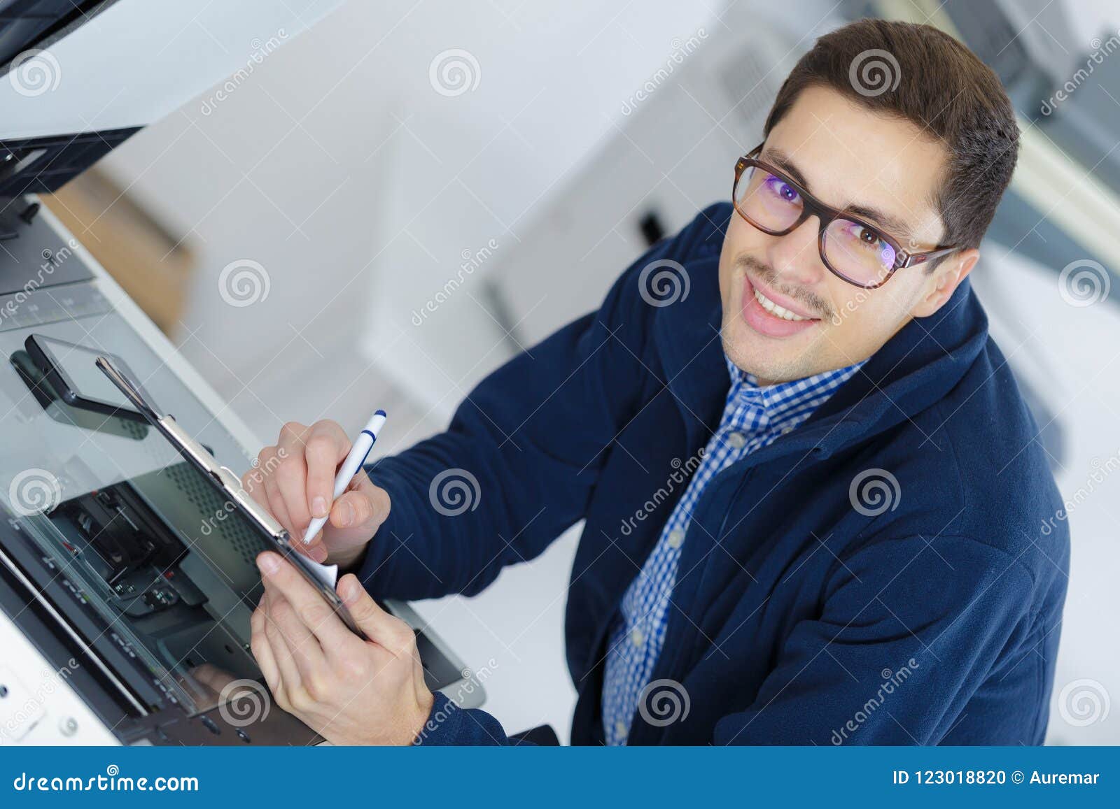 Computer Technician Checking Something in Pad Stock Photo - Image of ...