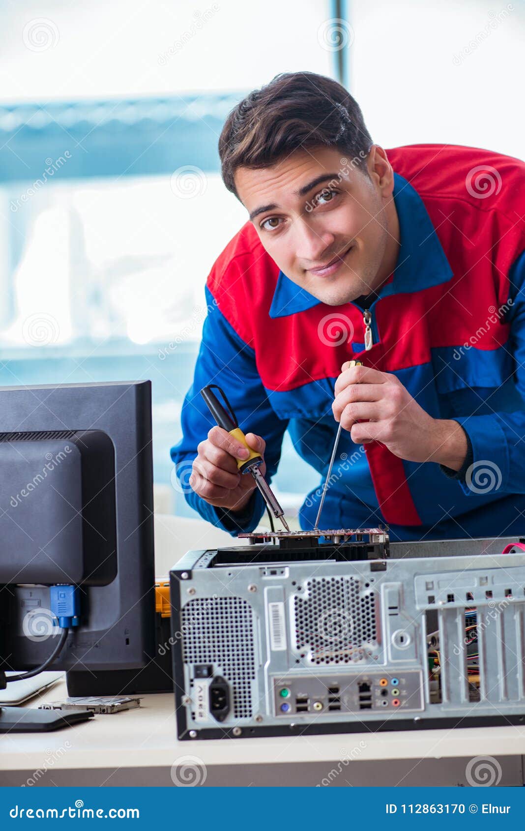 The Computer Technician Repairing Broken Computer in Workshop Stock ...