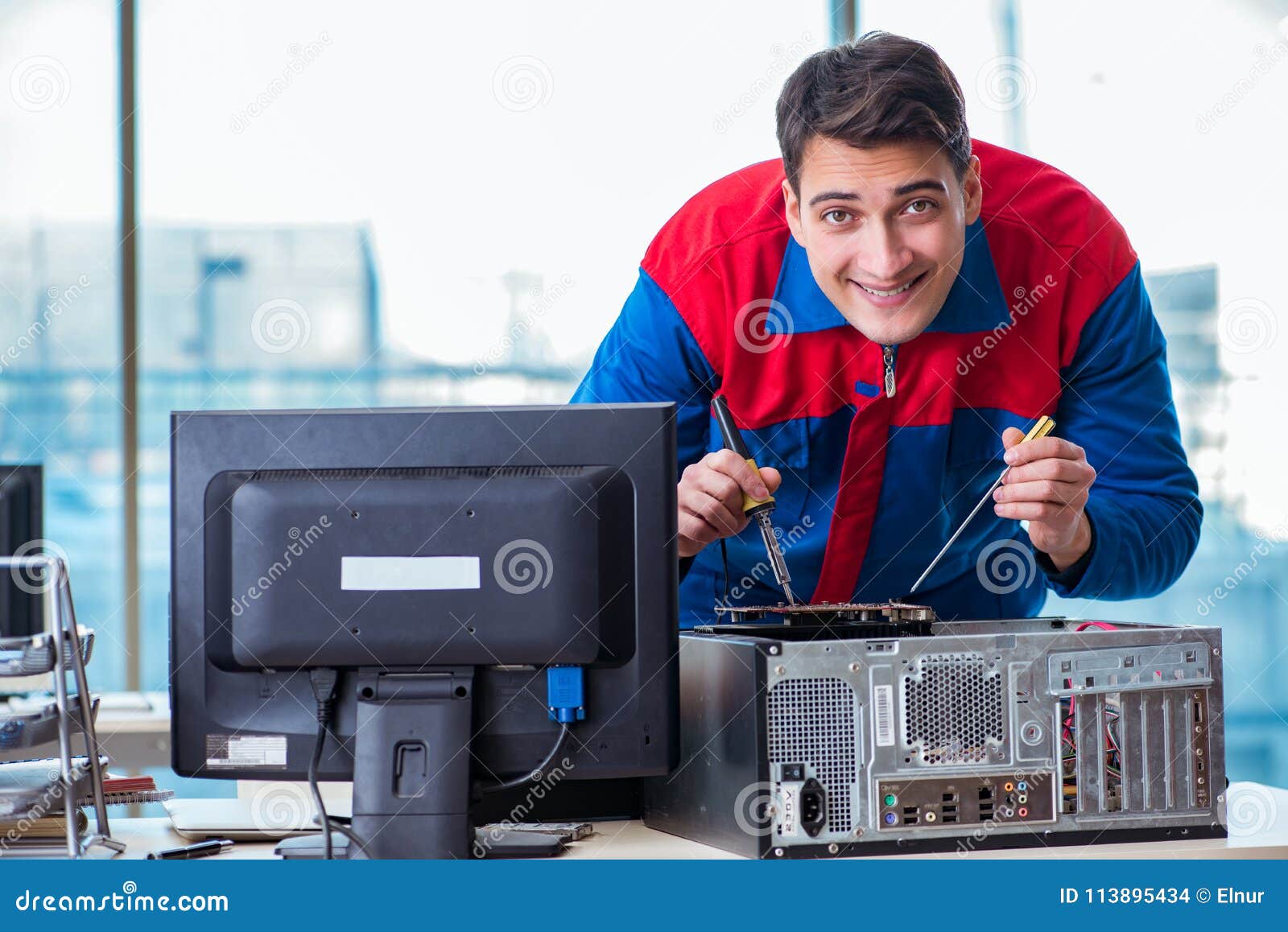 The Computer Technician Repairing Broken Computer in Workshop Stock ...