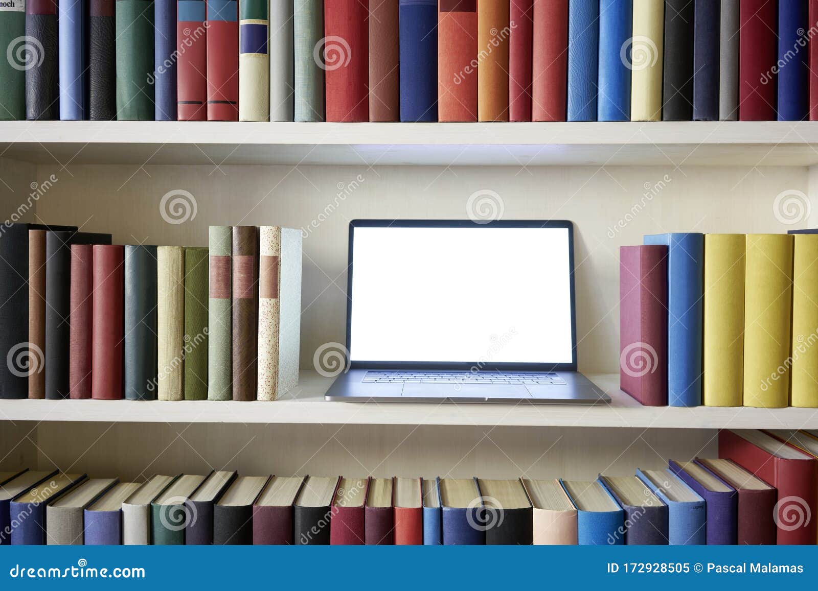 Computer Technology in Colorful Bookcase Stock Image - Image of ...