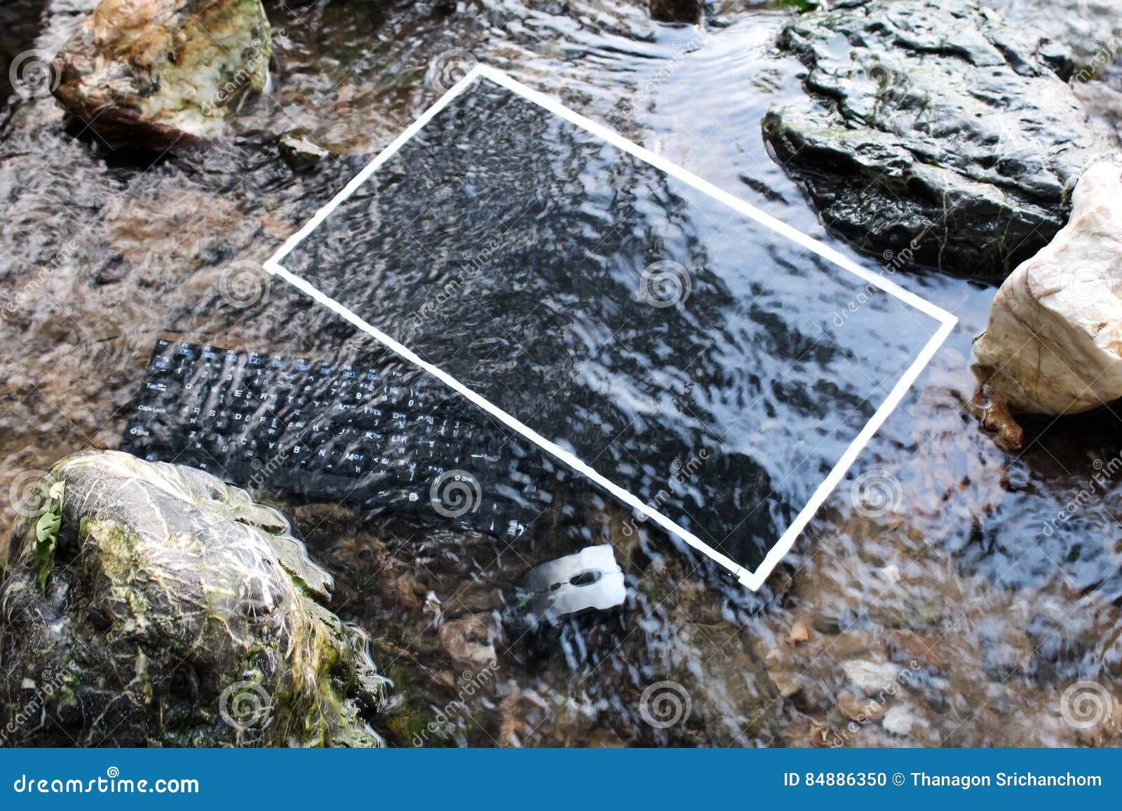 The Computer Under the Surface of the Water in a Waterfall. Stock Photo ...