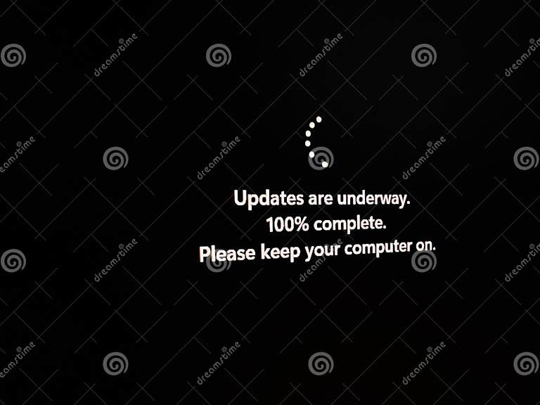 Computer Update Screen with Progress Message and Loading Symbol Stock ...