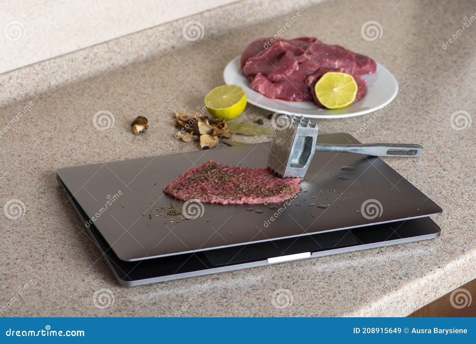 Computer is Used As a Kitchen Board. Meat on Laptop is Ready To Beat ...