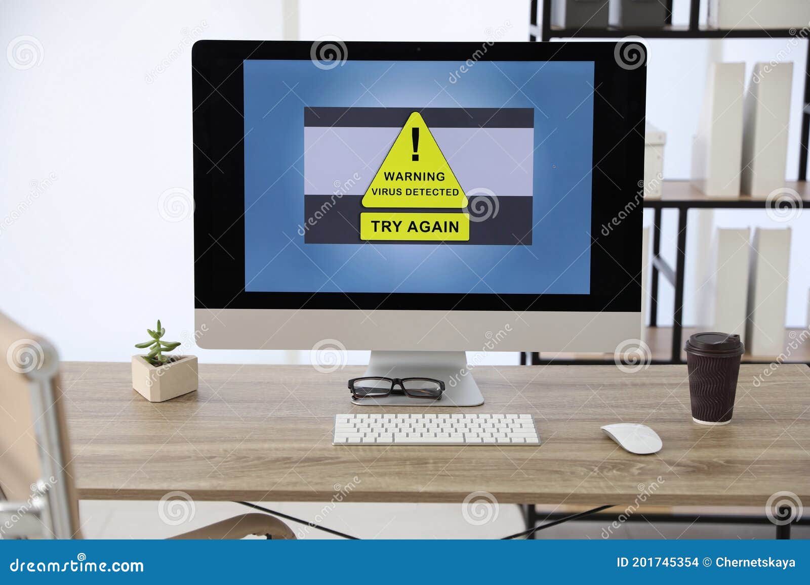 Computer with Warning about Virus Attack on Screen in Office Stock ...