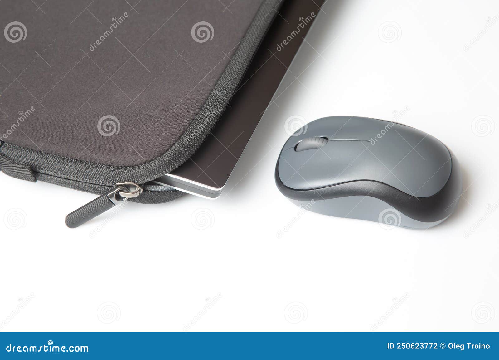 Computer Wireless Mouse Next To a Laptop on a White Table Close-up ...