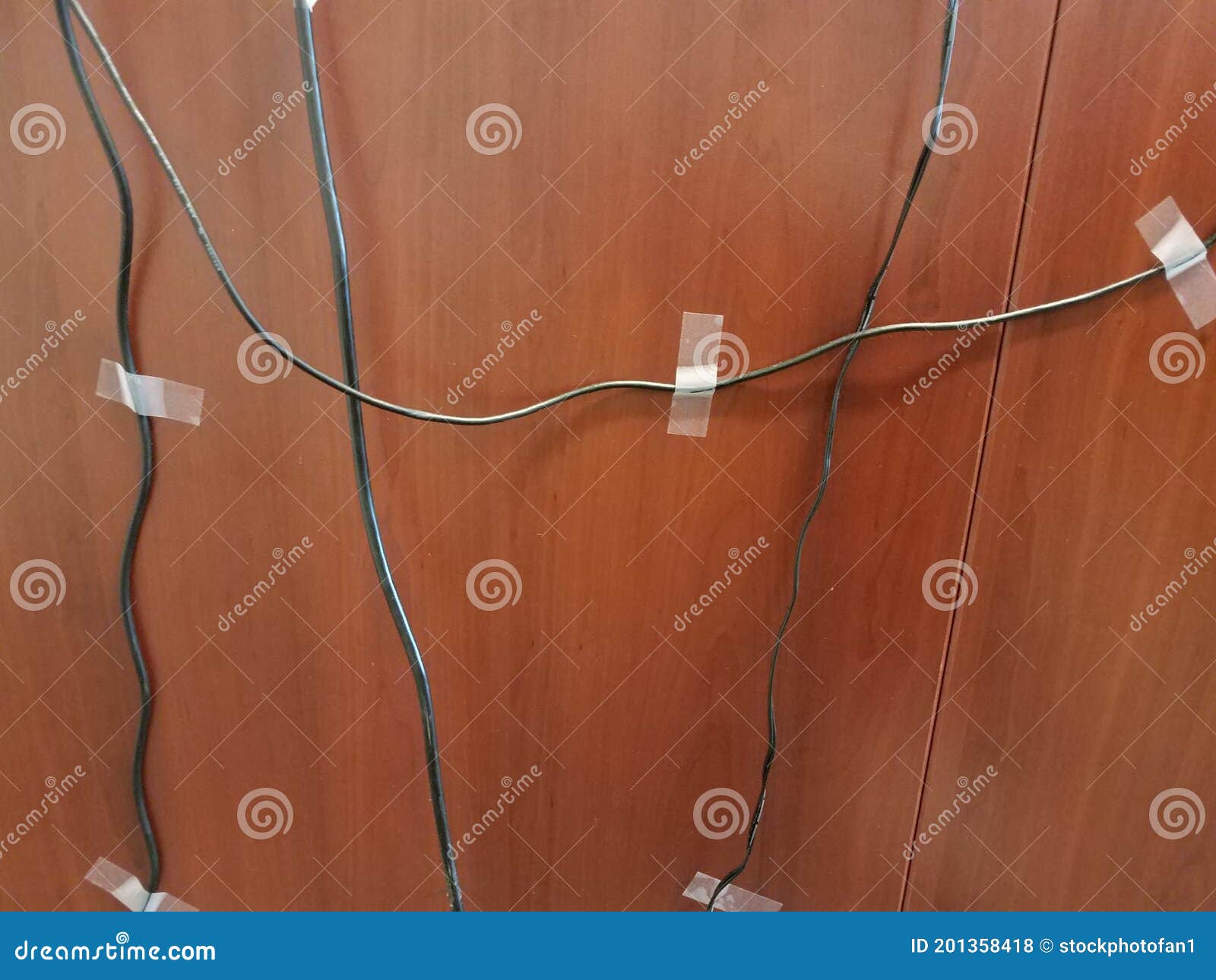 Computer Wires Taped To a Brown Wood Desk Stock Photo - Image of brown ...