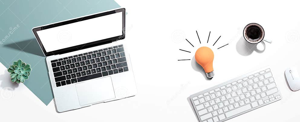 Computers with a Light Bulb Stock Image - Image of creativity ...