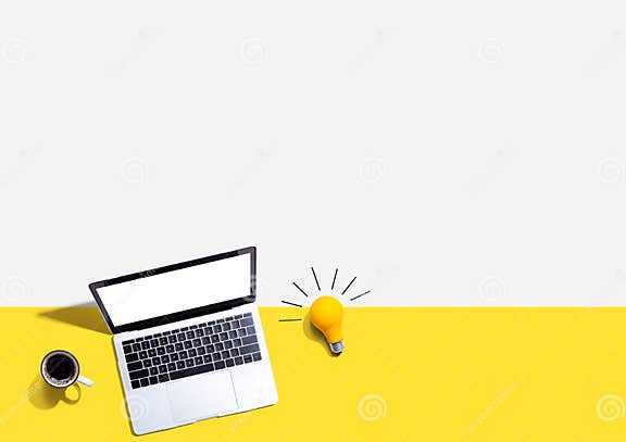 Computers with a Light Bulb Stock Photo - Image of creative, creativity ...