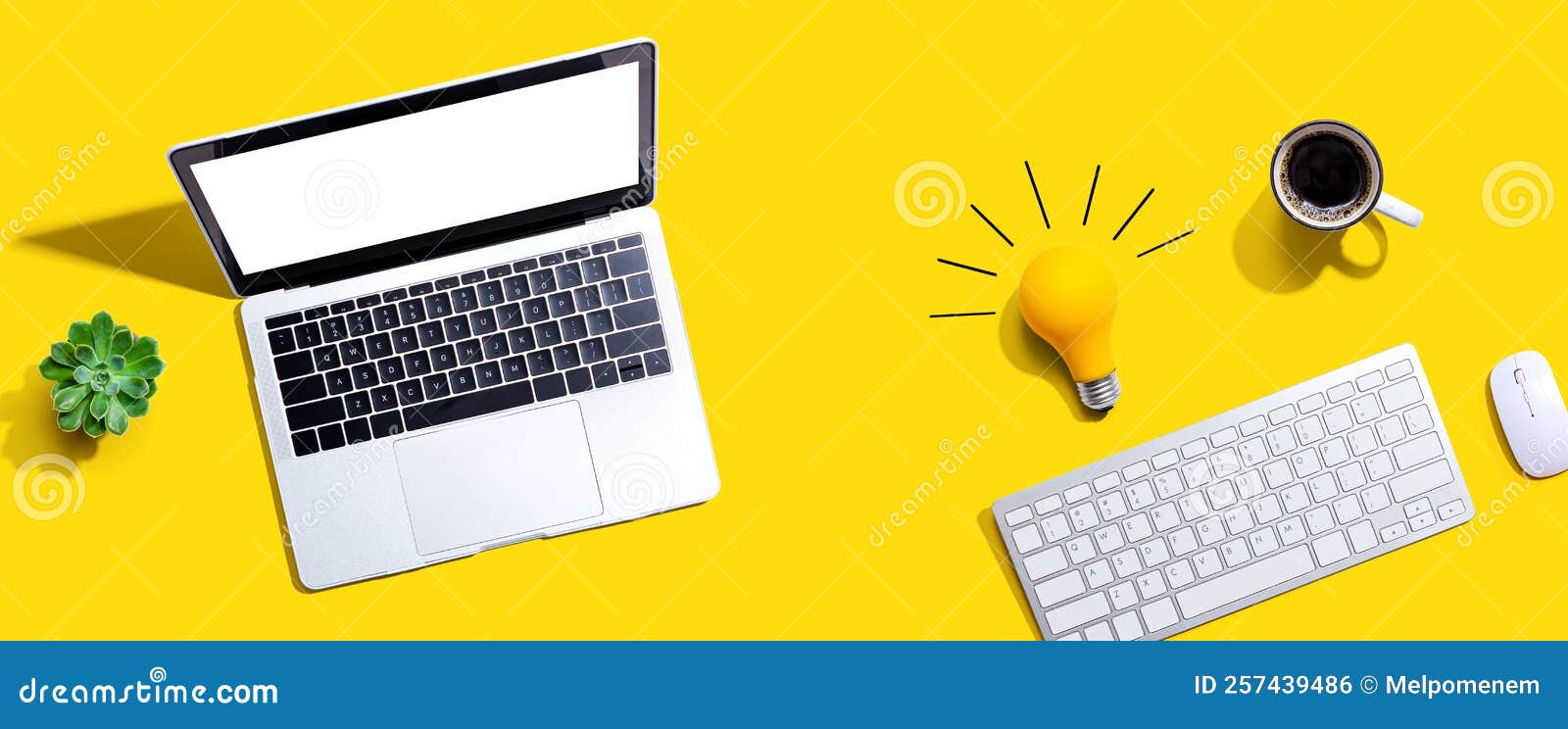 Computers with a Light Bulb Stock Photo - Image of meeting, desk: 257439486