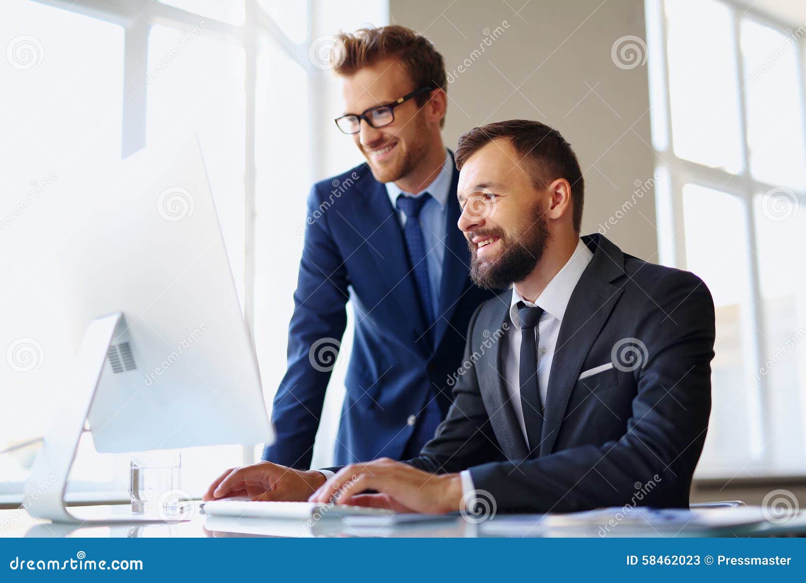 Computing in office stock image. Image of handsome, teamwork - 58462023
