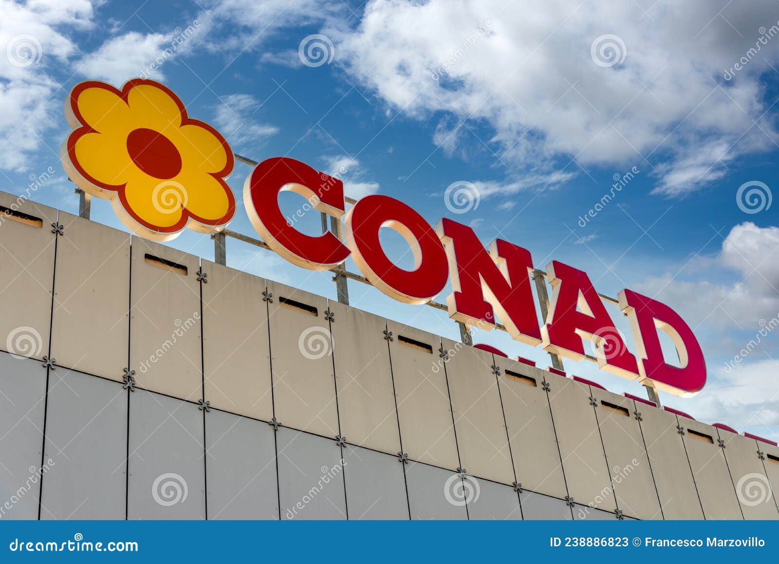 Conad Supermarket Logo Sign on Blu Cloudy Sky Editorial Stock Photo ...