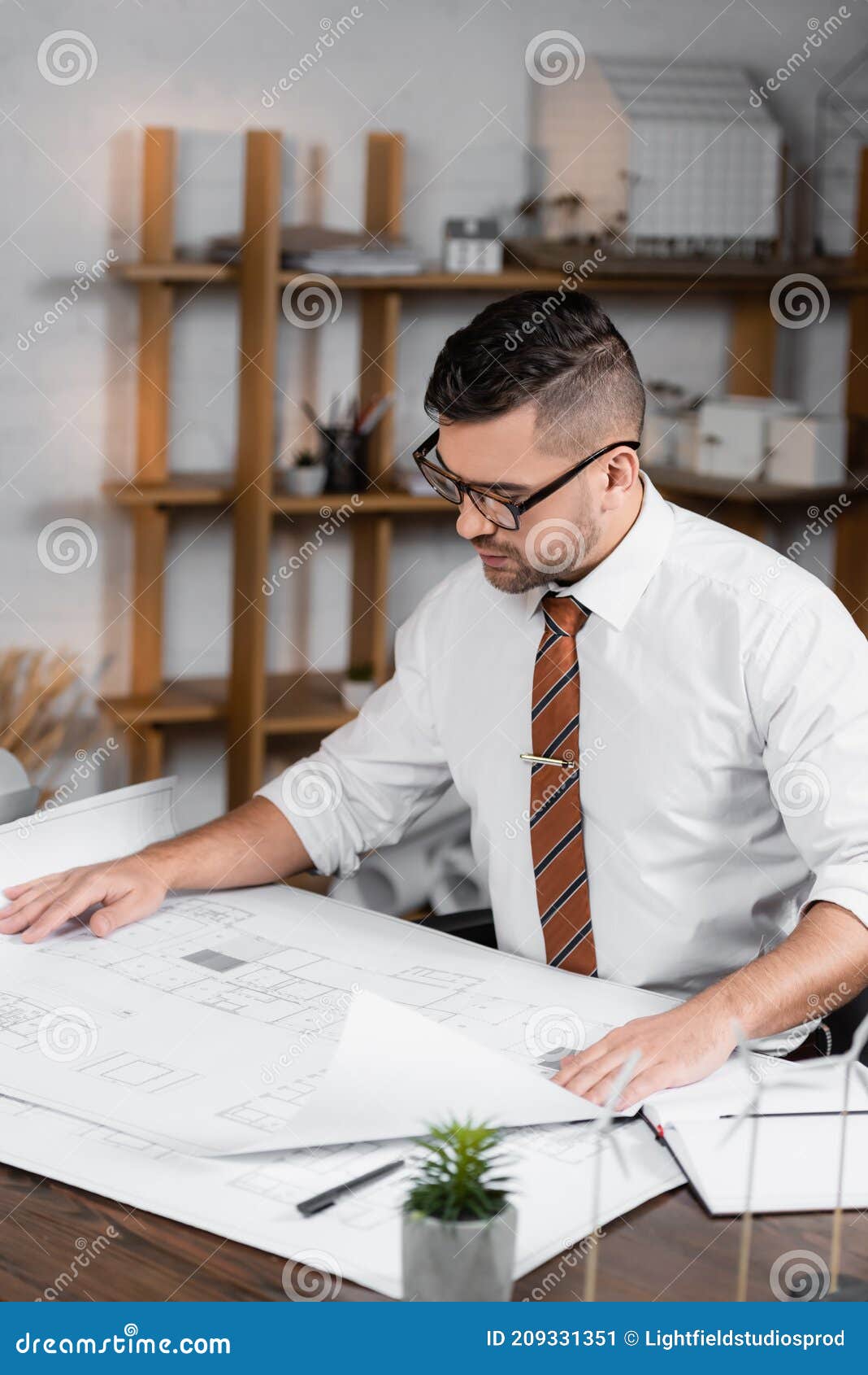 Concentrated Architect Working on Project in Stock Image - Image of ...