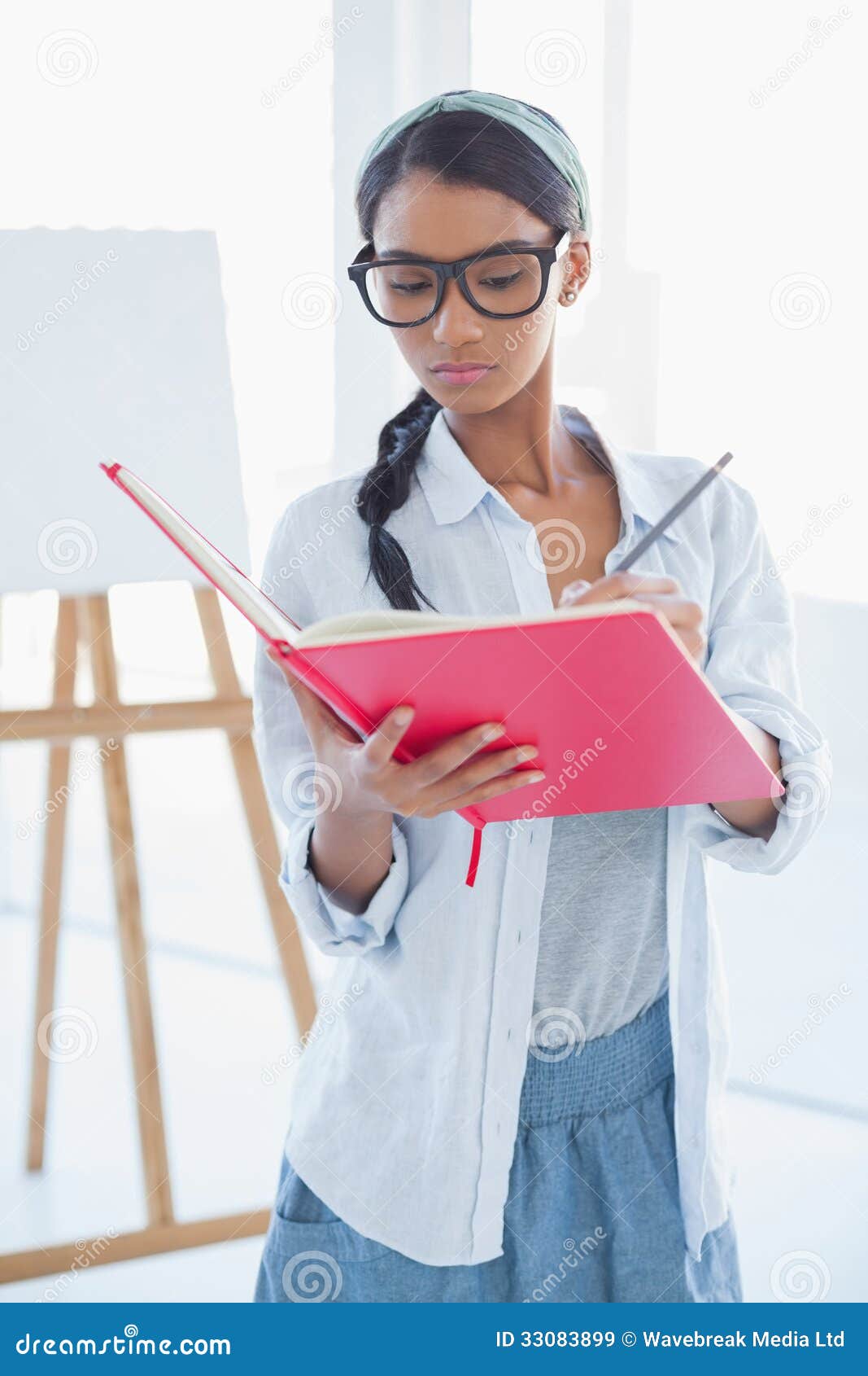 Concentrated Attractive Artist Drawing on Her Notebook Stock Image ...