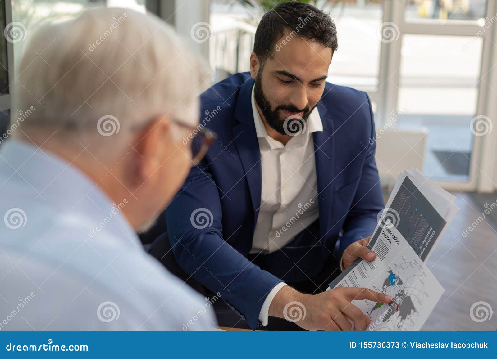 Businessman Bowing Toward Camera Royalty-Free Stock Image ...