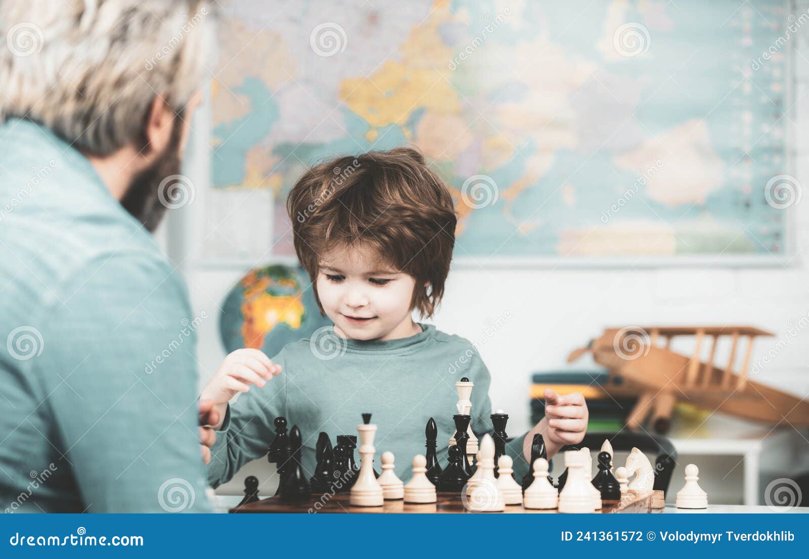 Concentrated Boy Developing Chess Strategy, Playing Board Game. Child ...