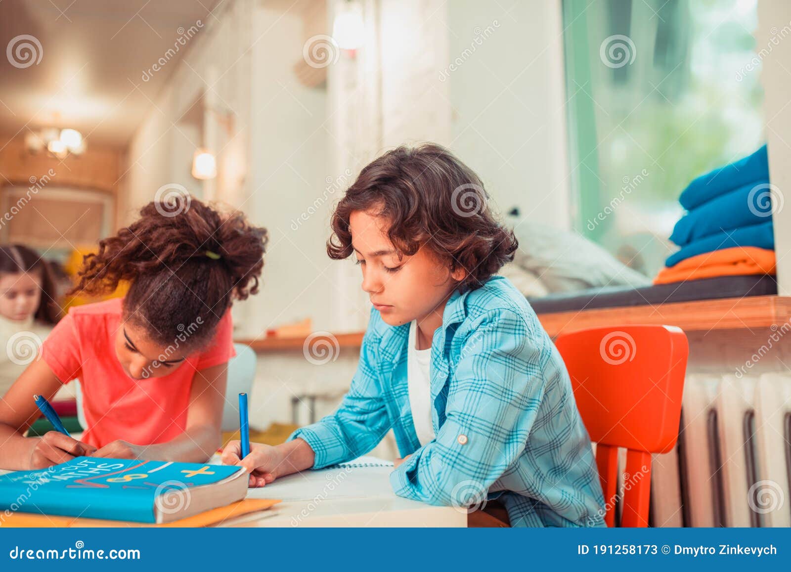 Concentrated Boy Solving Math Problems at Class Stock Image - Image of ...