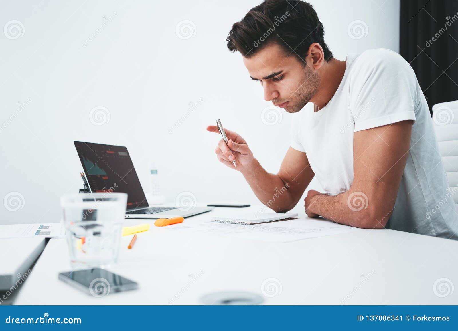 Concentrated Building Designer Working with Drawing Plan and Competer ...