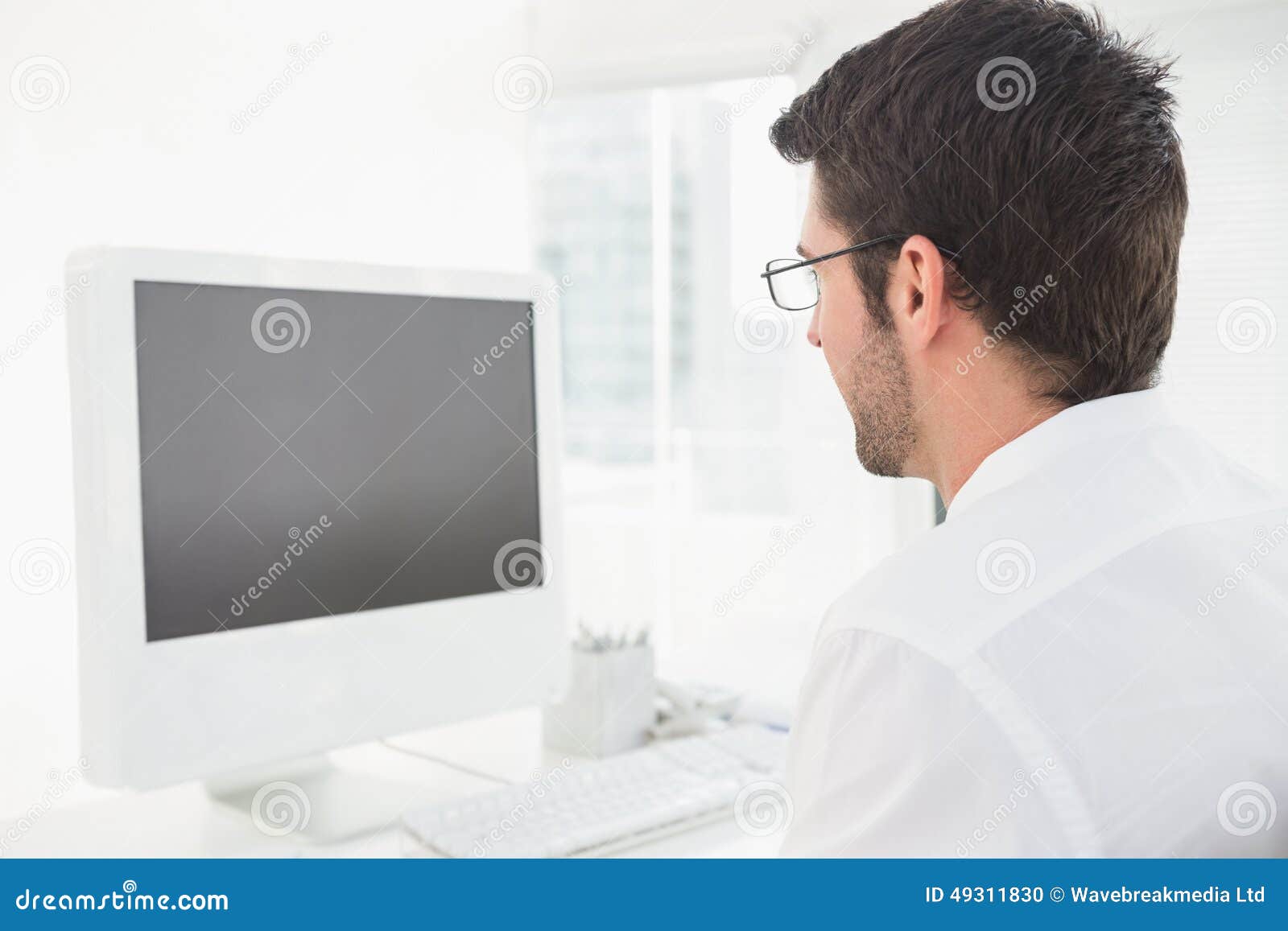 Concentrated Businessman with Glasses Using Computer Stock Photo ...