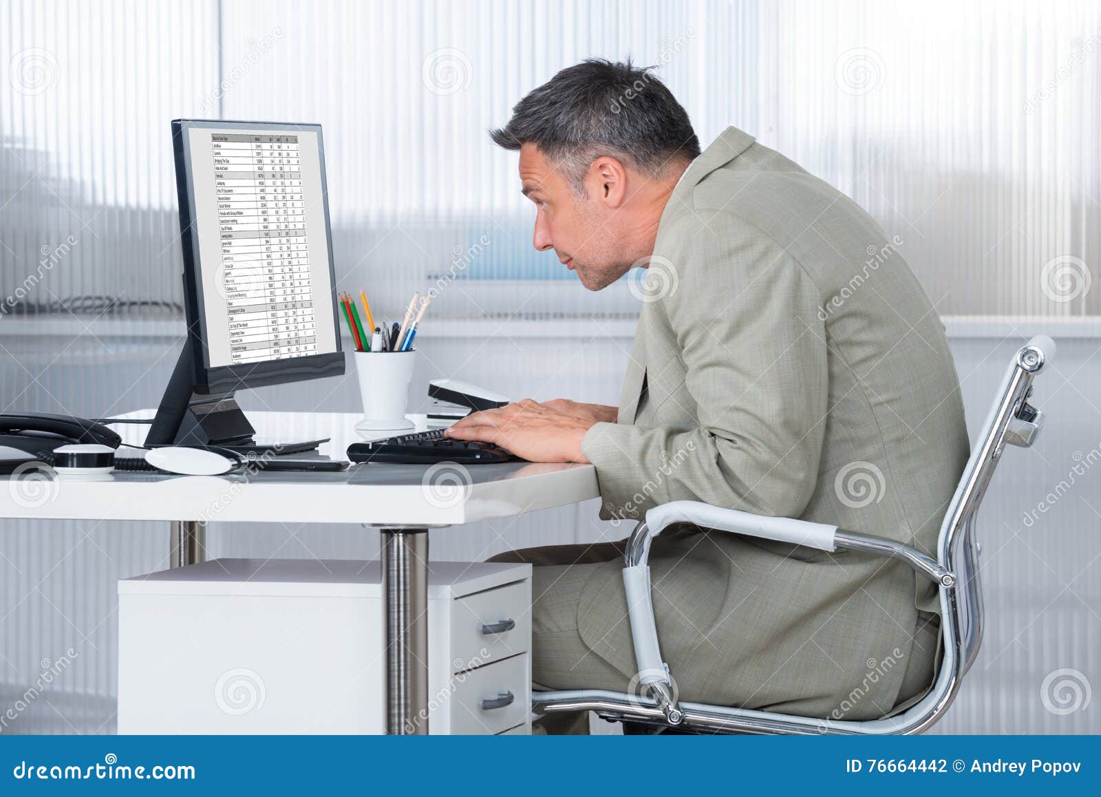 Concentrated Businessman Using Computer at Desk Stock Photo - Image of ...