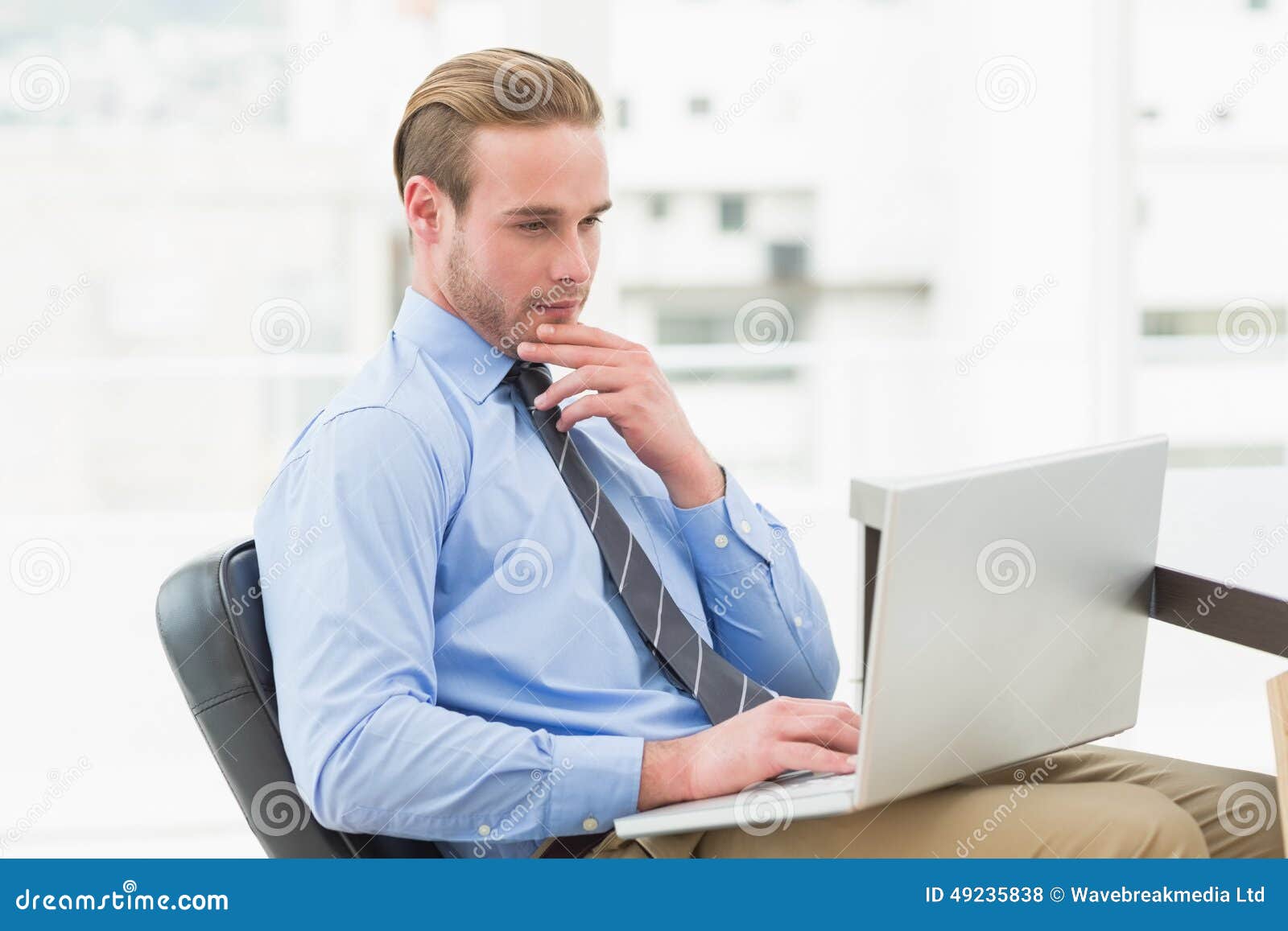Concentrated Businessman Using Laptop Stock Photo - Image of ...