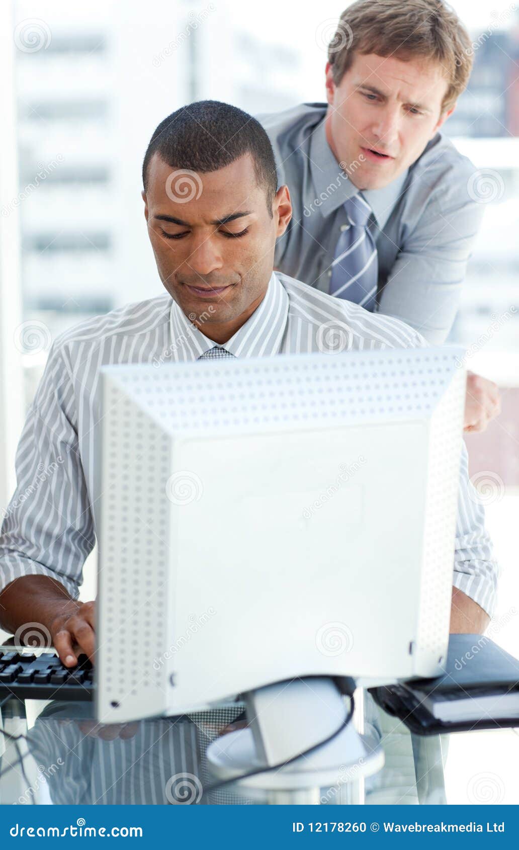 Concentrated Businessmen at a Computer Stock Photo - Image of male ...