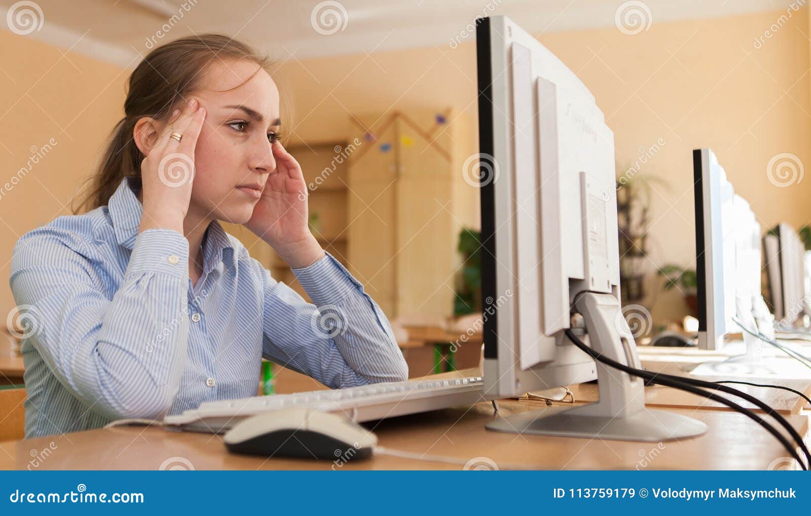 Concentrated Businesswoman Trying To Solve a Difficult Assignment on ...