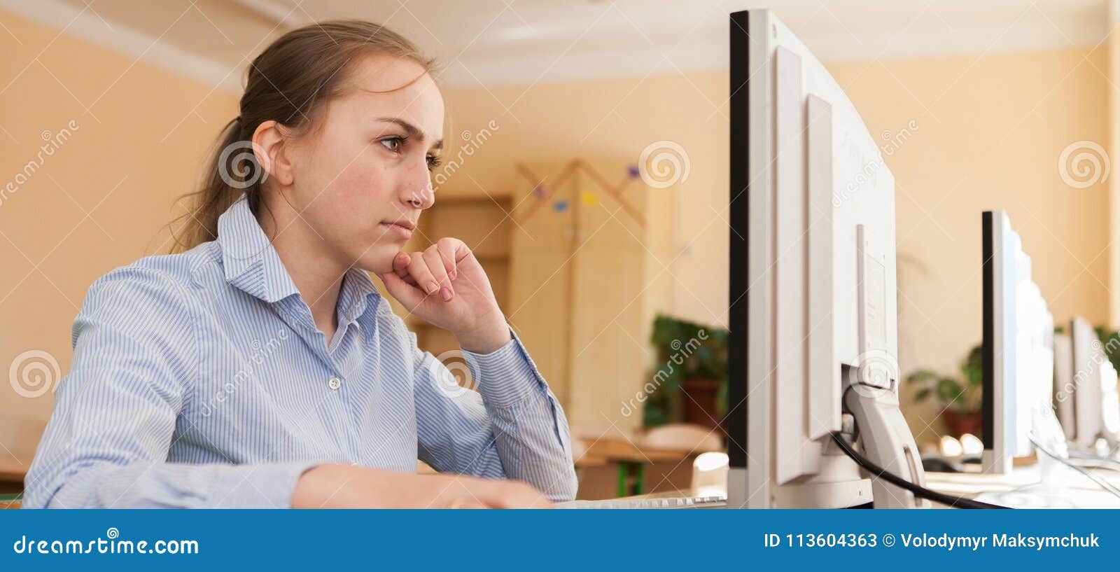 Concentrated Businesswoman Trying To Solve a Difficult Assignment on ...